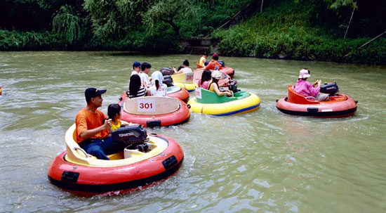 Fun In The Park - The Attraction Of Water Bumper Boats